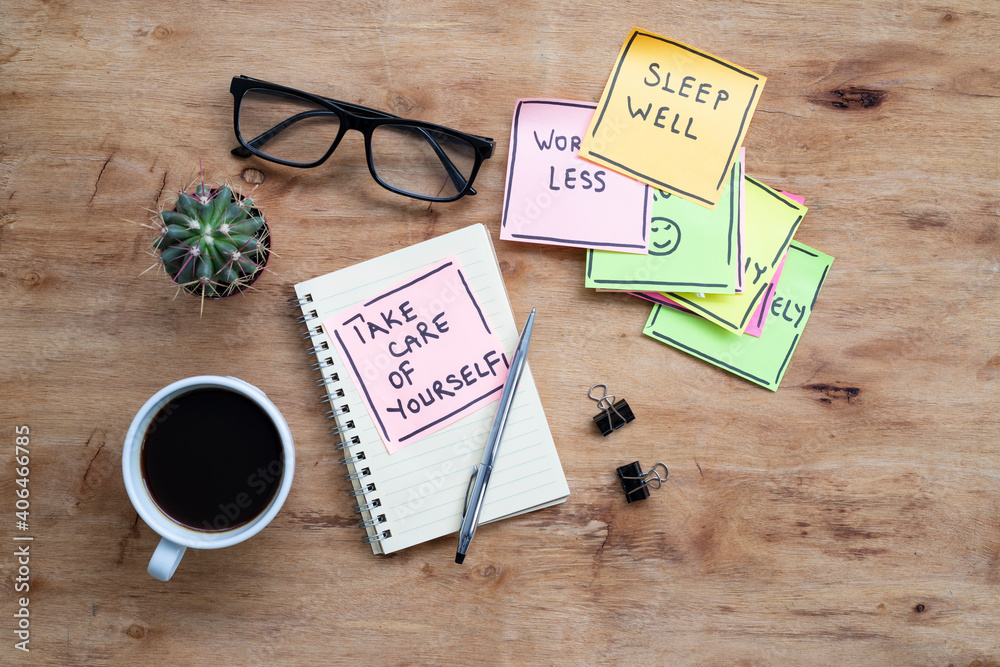 Bank notebook with pen are on top of wooden office desk table. Take ...