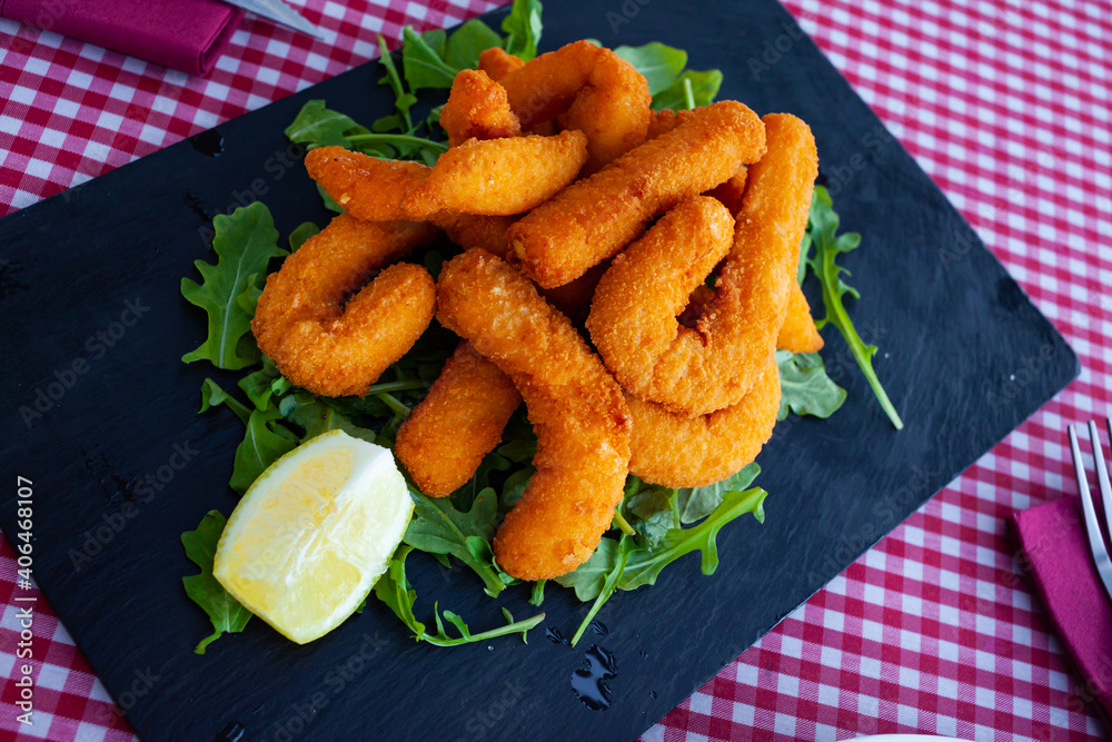Sepia breaded and fried closeup (chocos, typical tapa in Spain) Stock ...