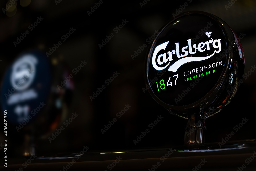 One draft with Carlsberg beer on black background in Singapore, SG, on ...