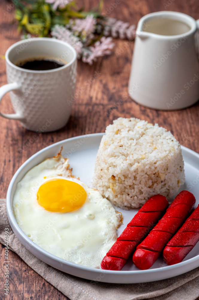 Hotsilog (vertical with coffee and cream)- is a famous Filipino meal ...