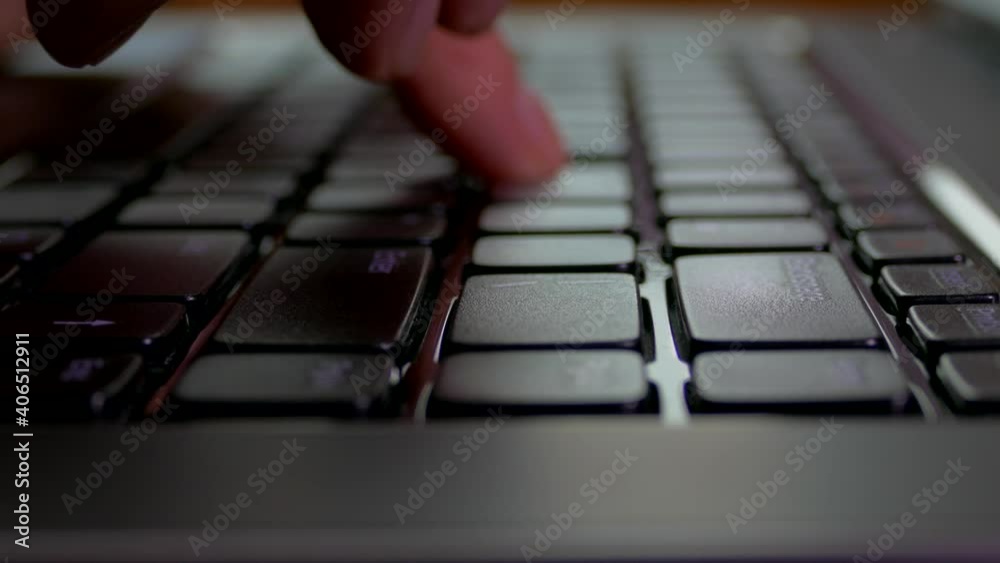 Press the buttons on the laptop keyboard. Work on computer. Type text ...