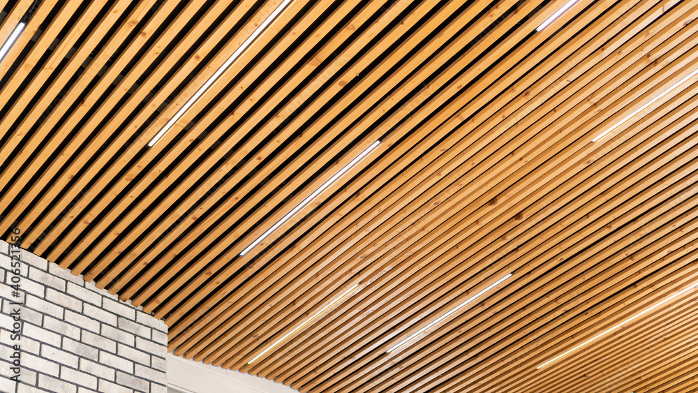 Close-up on a loft-style pine wood plank ceiling combined with white ...