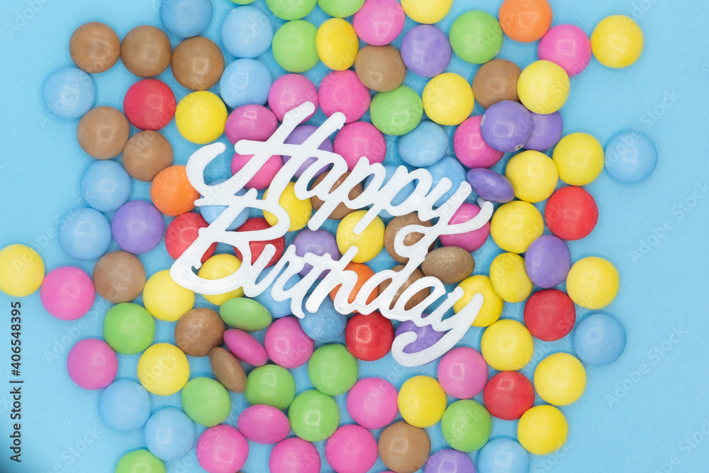 Colorful birthday greetings with smarties and the words happy birthday ...