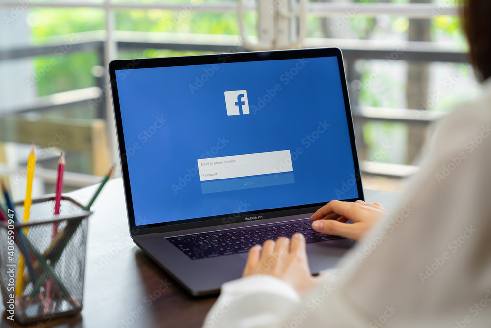 BANGKOK ,THAILAND - January 18, 2021 : women using the Facebook screen ...