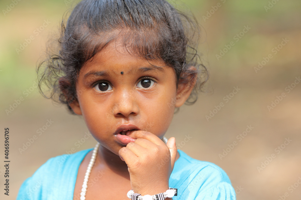 Cute Indian little girl portrait. Stock Photo | Adobe Stock