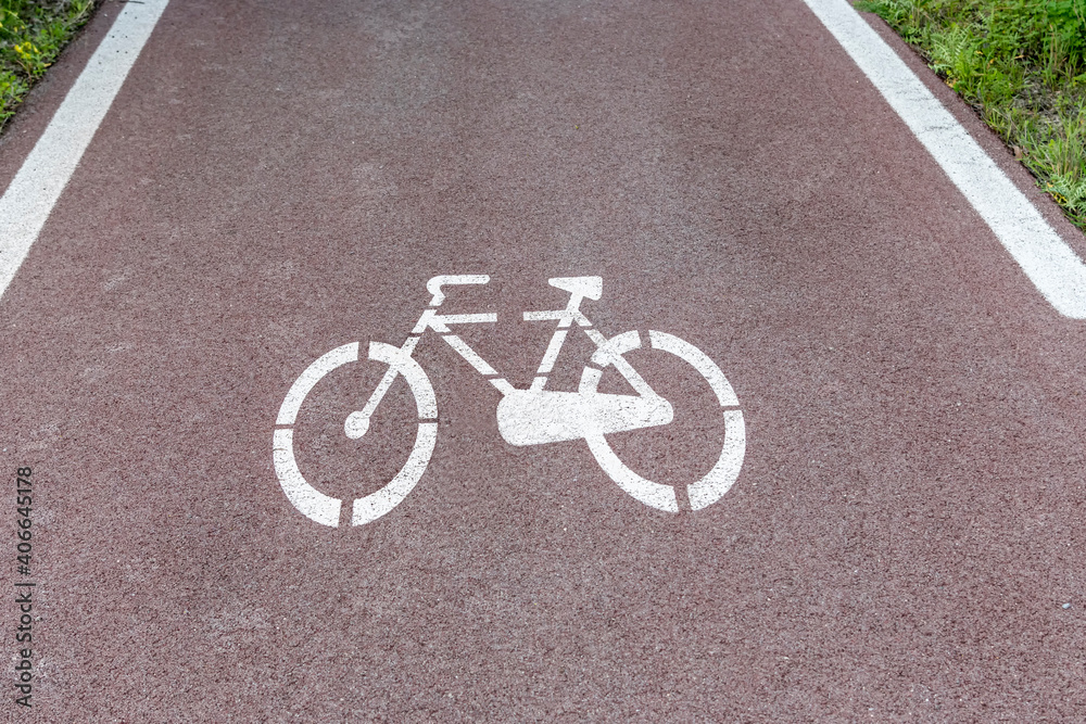 Cycle path with road signs in the woods. Stock Photo | Adobe Stock