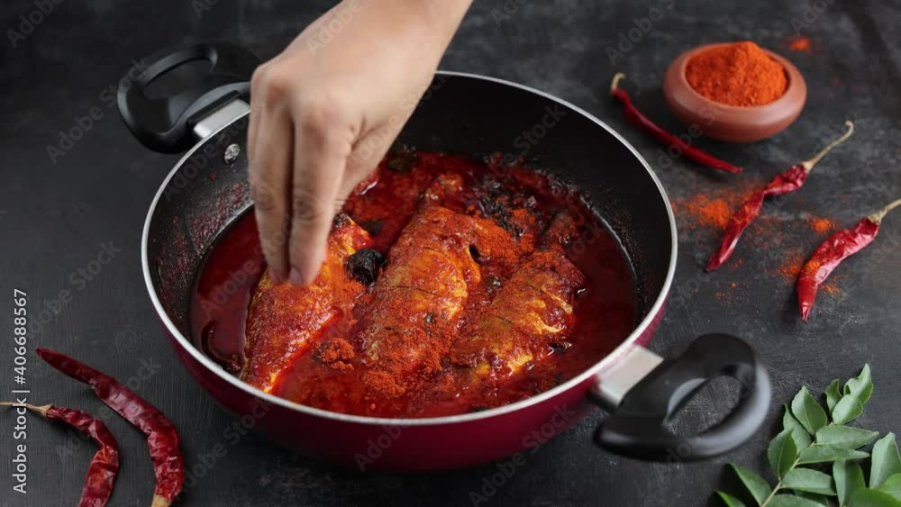 Spicy Mackerel fish curry gravy , cooking spicy Kerala fish curry ...