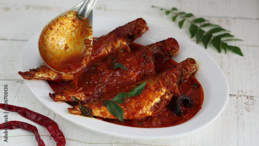 Spicy Mackerel fish curry gravy , cooking spicy Kerala fish curry ...