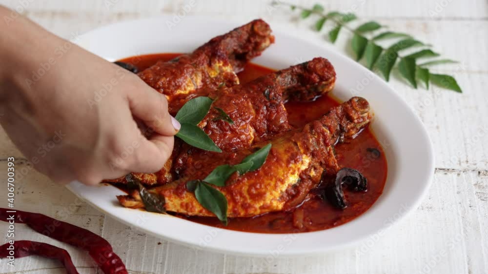 Spicy Mackerel fish curry gravy , cooking spicy Kerala fish curry ...