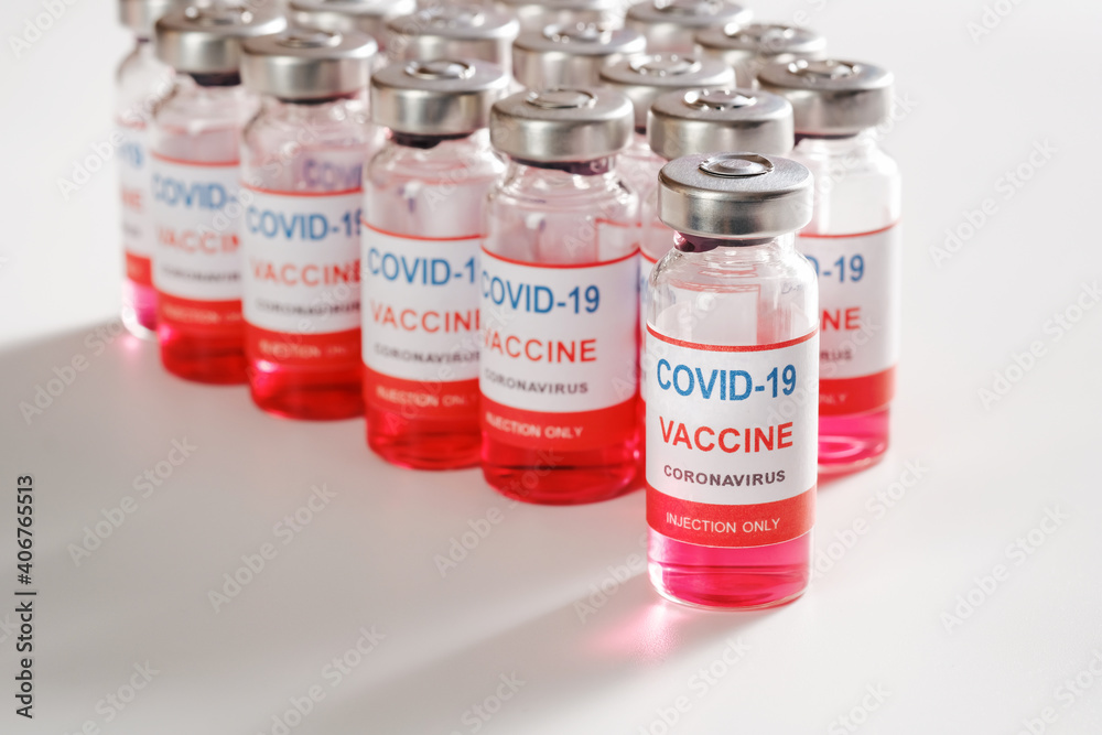 Many vaccine glass bottles for vaccination against COVID-19 SARS-CoV-2 ...
