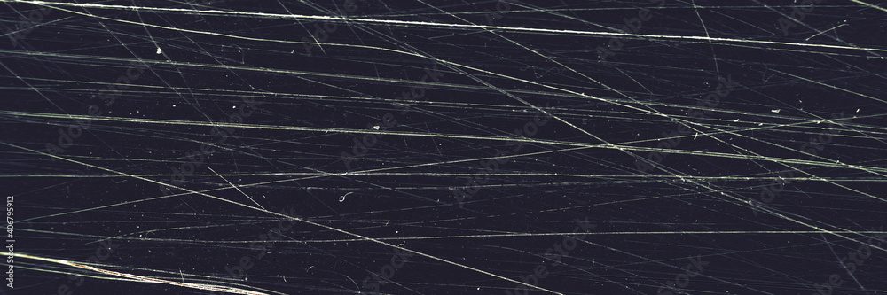 Scratched film texture. Many bright lines in different directions ...