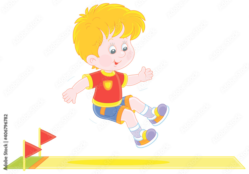 Cheerful little boy in a long jump with a running start in a ...