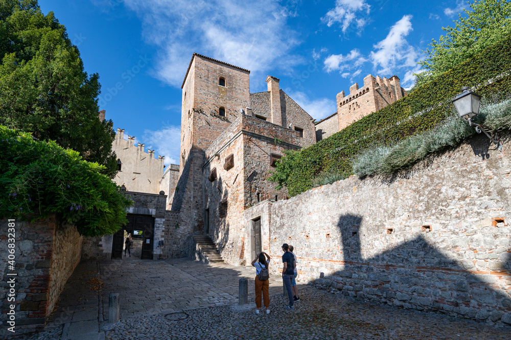 The medieval village of Monselice, walk towards the castle, on a day ...