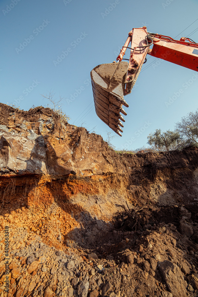 escavatore scavatore Stock Photo | Adobe Stock