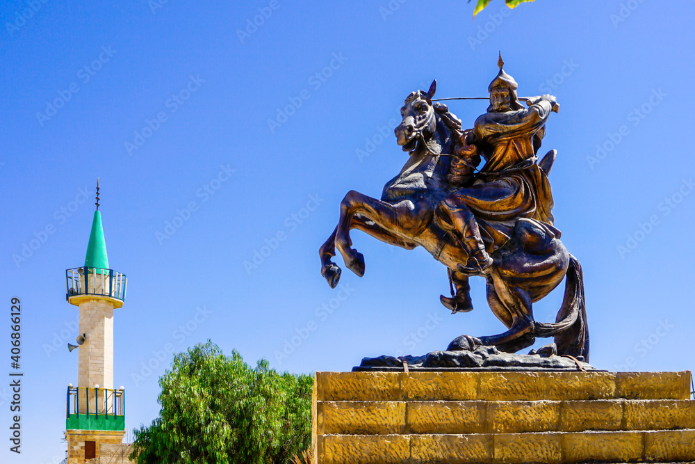 Jordan, city of Kerak, warrior statue of Sultan Saladin and a mosque ...