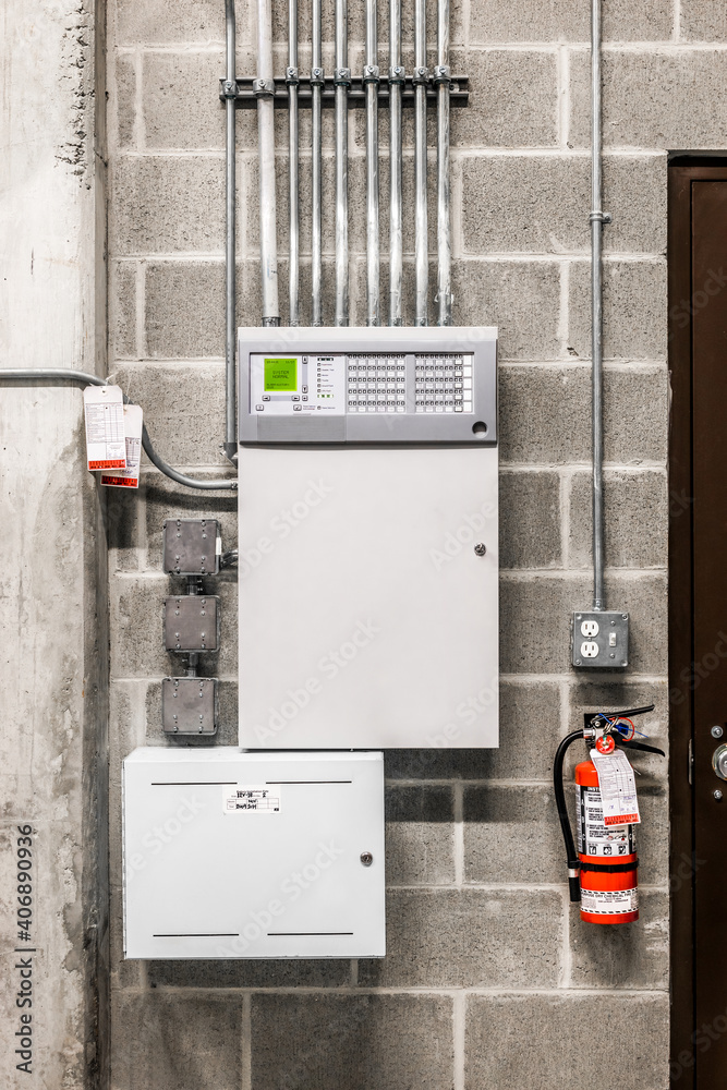 Fire alarm control panel, cabinet, fire extinguisher and service tags ...