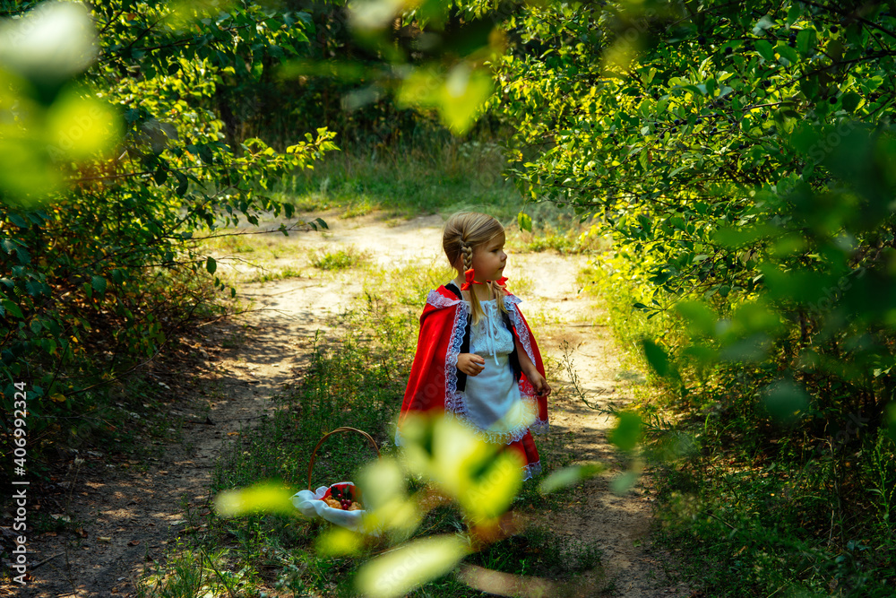 girl in the forest in red clothes, Little Red Riding Hood, summer ...