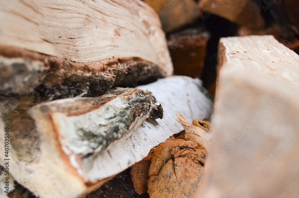 Close-up texture of dry fireplace logs. Wood background. Macro shooting ...