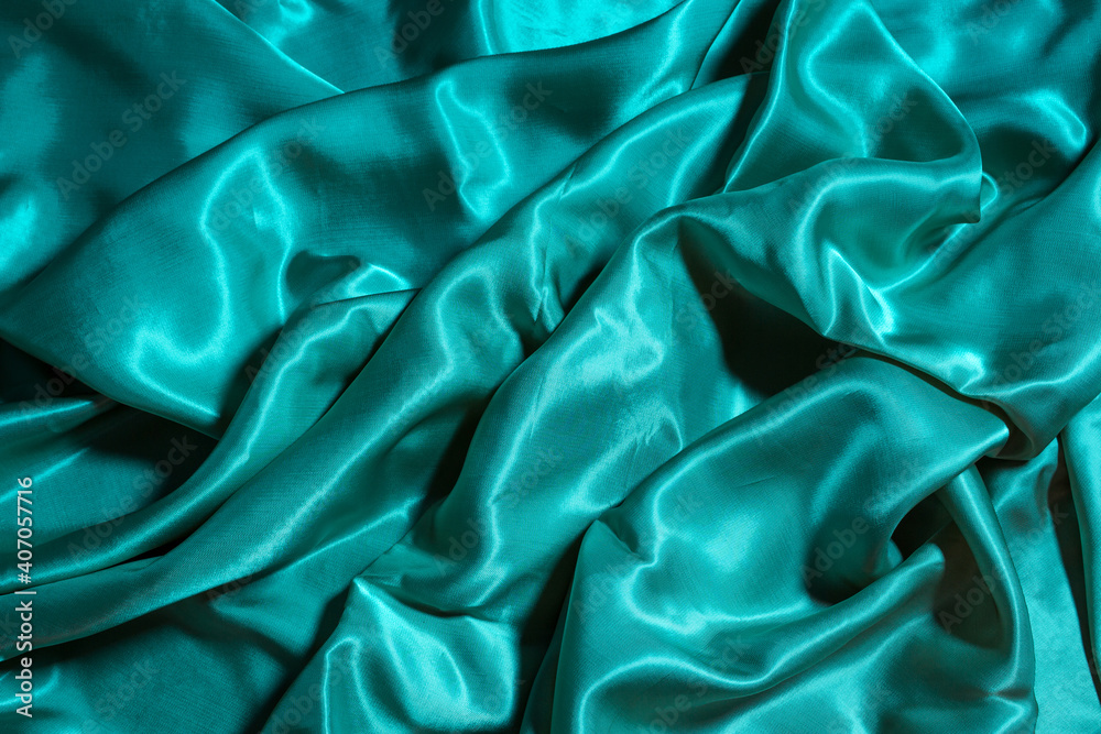 Smooth elegant Silk fabric in neon tidewater green light. Trend color ...