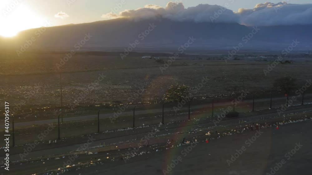 Polluted nature at sunset. Aerial view of landfill with garbage and ...