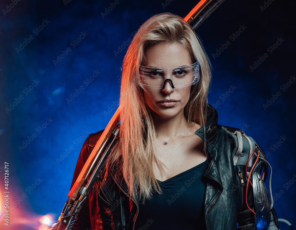 Dressed in black jacket cyber woman from the future poses with her ...