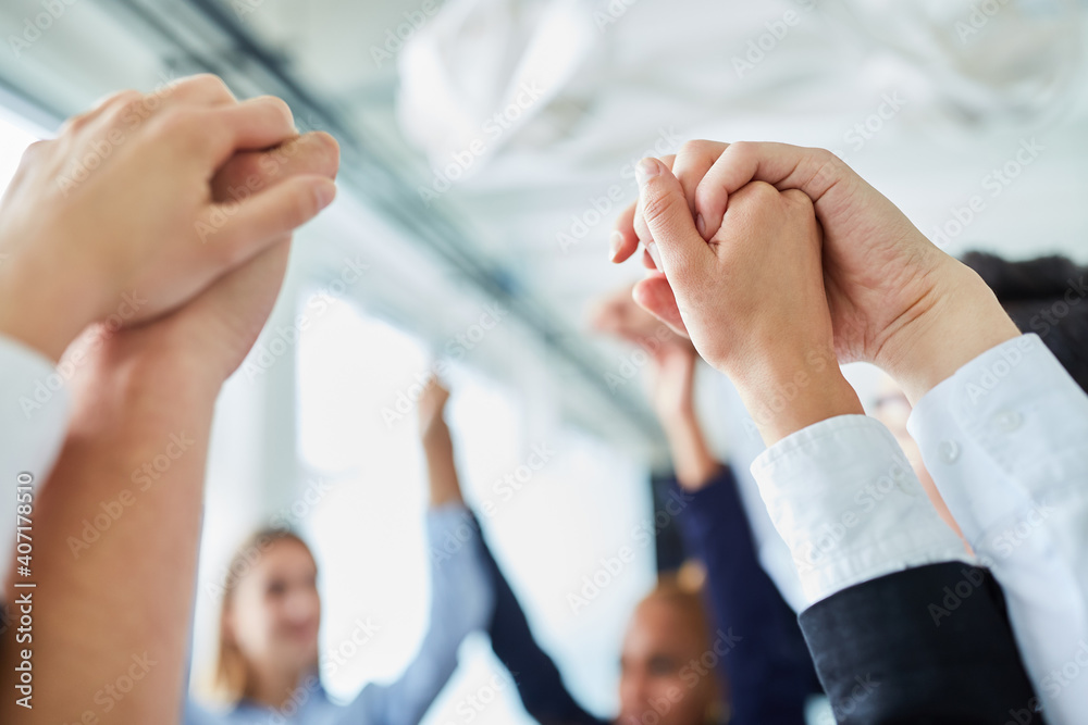 Holding hands for motivation and team building Stock Photo | Adobe Stock