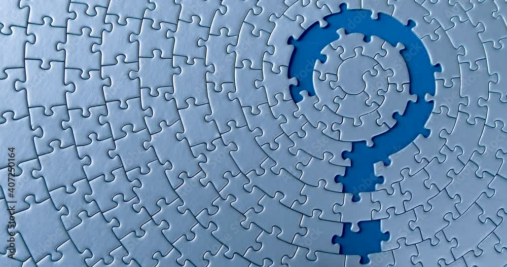 Gray circular puzzles stacked on blue background. Female hand is ...