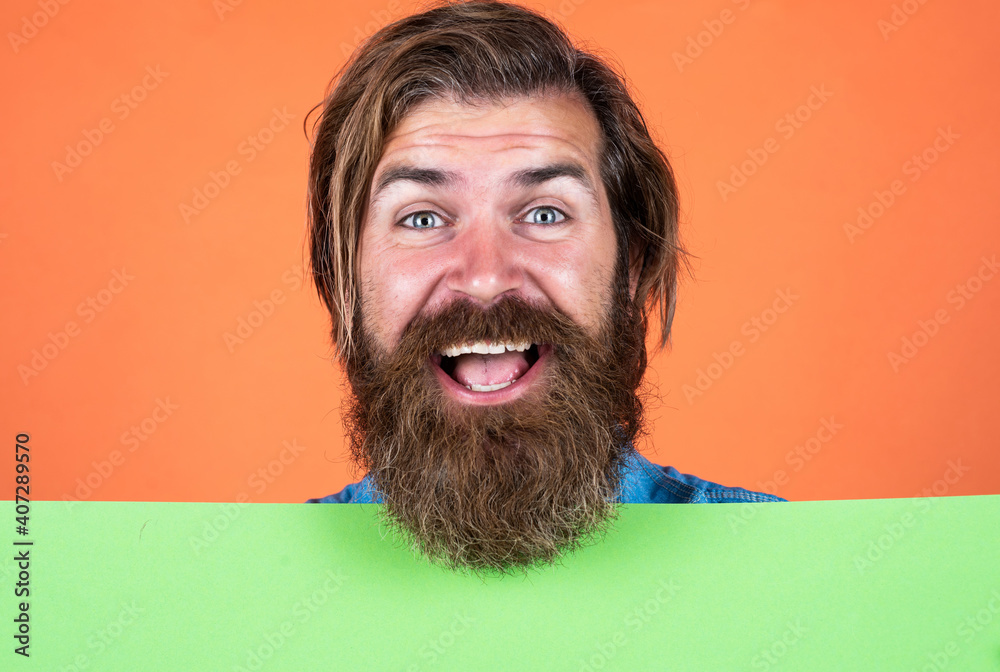 Our products are on sale. barber concept. happy hipster with beard at ...