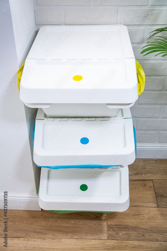 Waste segregation. Recycling bins for plastic, paper and other trash ...