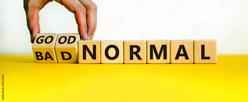 Good or bad normal symbol. Hand turns cubes and changes words 'bad ...