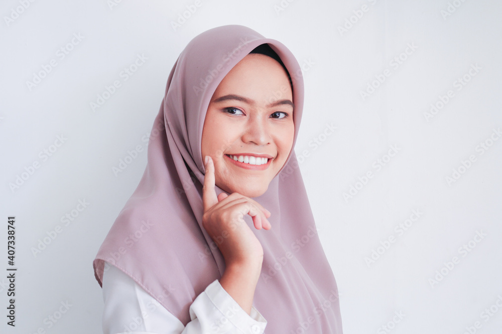 Young Asian Islam woman wearing headscarf with clean fresh white skin ...