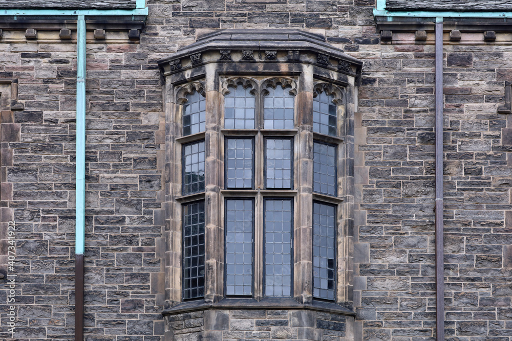 Bay window with leaded glass, on gothic style stone building Stock ...