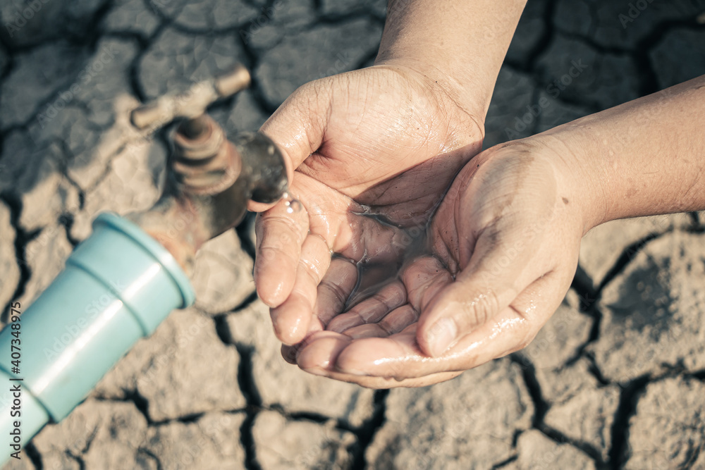 Hand for drinking water to live through drought, Concept drought and ...