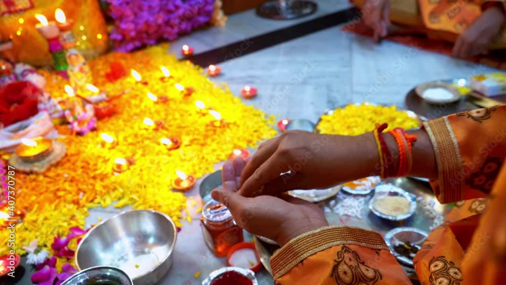 Hindu Woman Performing Diwali Pooja Ritual. close up Stock Video ...
