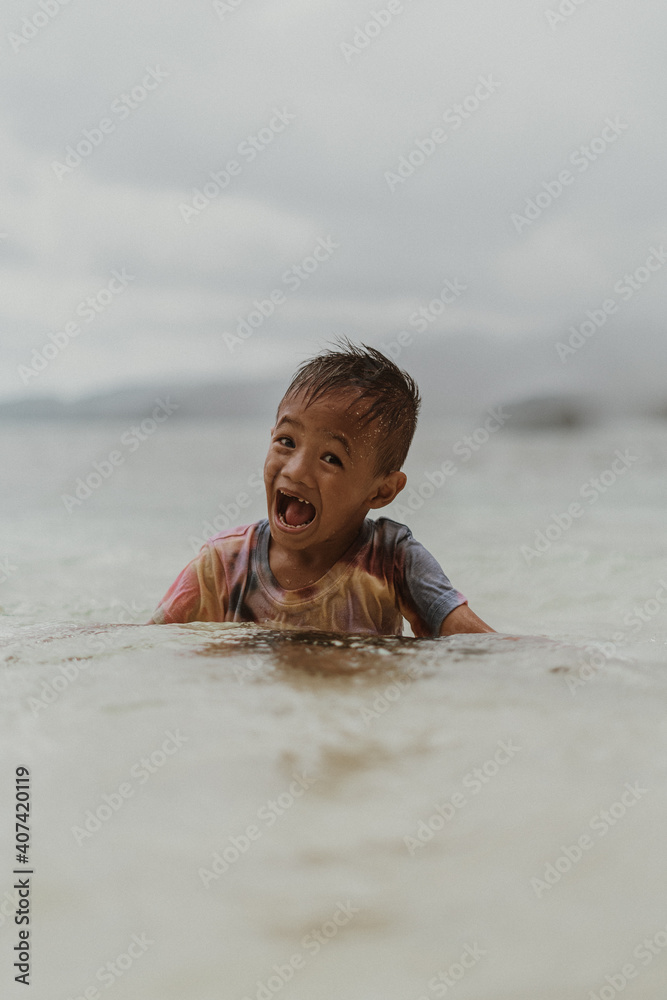 Portrait Happy Little Filipino Asian Boy Running and Playing while ...