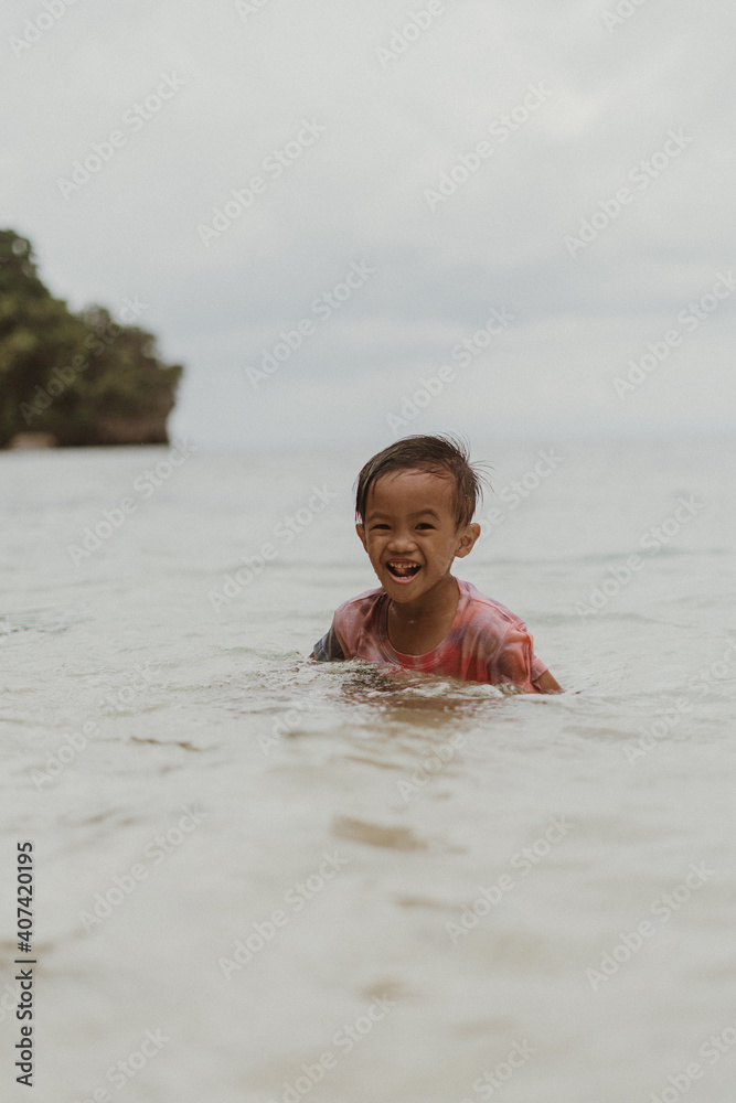 Portrait Happy Little Filipino Asian Boy Running and Playing while ...