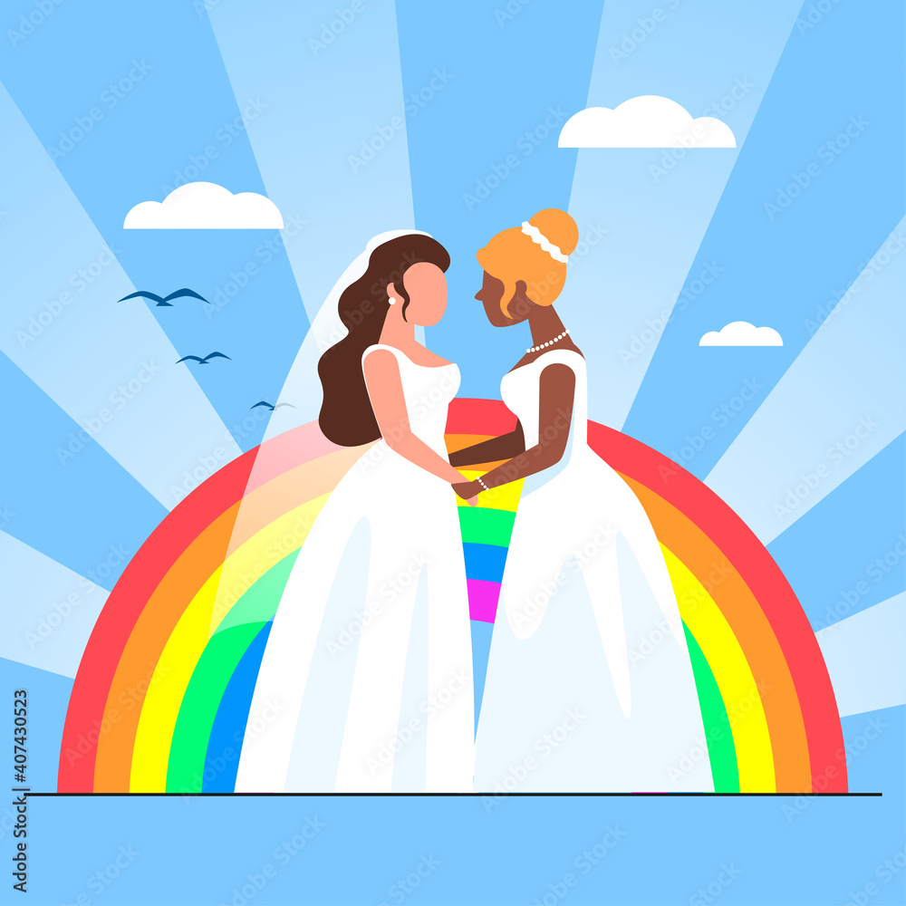 Two lesbian in dresses holding hands in front of big pride rainbow flag ...
