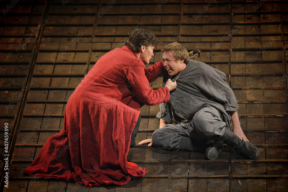 Actors of the theater in medieval costumes play in the play Stock Photo ...
