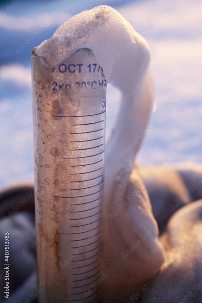 A large amount of foam is poured out of the graduated cylinder as a ...