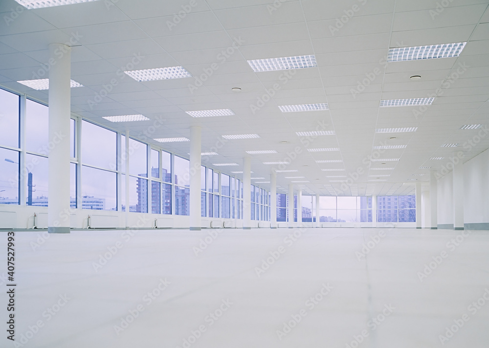 Open space of empty office room with glass windows without partitions ...
