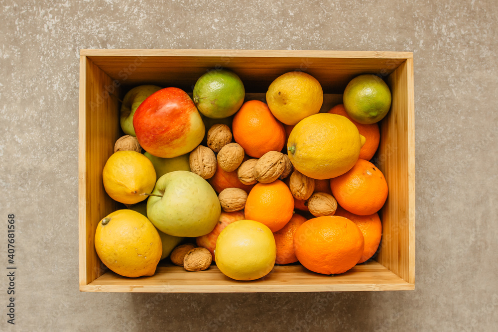 Fresh fruits in a wooden box. Mix of fruits. A lot of vitamins. Variety ...