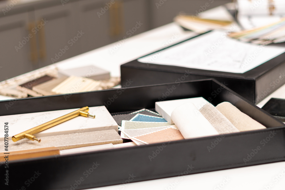 Interior designer's working table, an architectural plan of the house ...