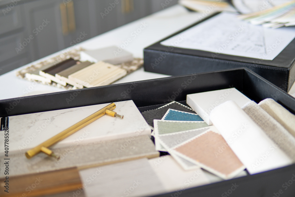 Interior designer's working table, an architectural plan of the house ...