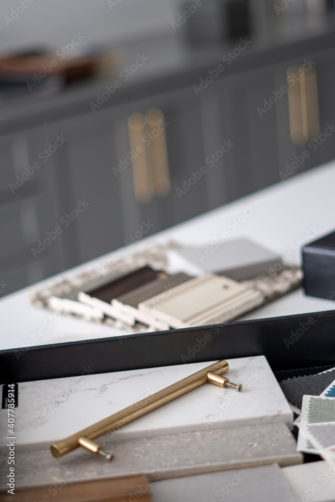 Interior designer's working table, an architectural plan of the house ...
