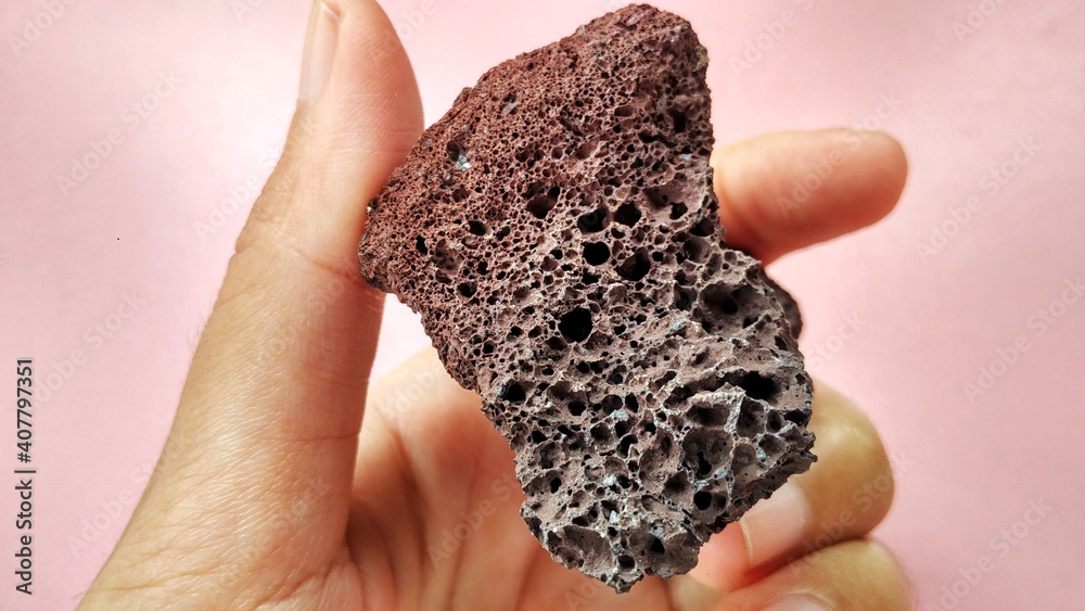 specimen Scoria igneous rock, black and brownish red color from the ...