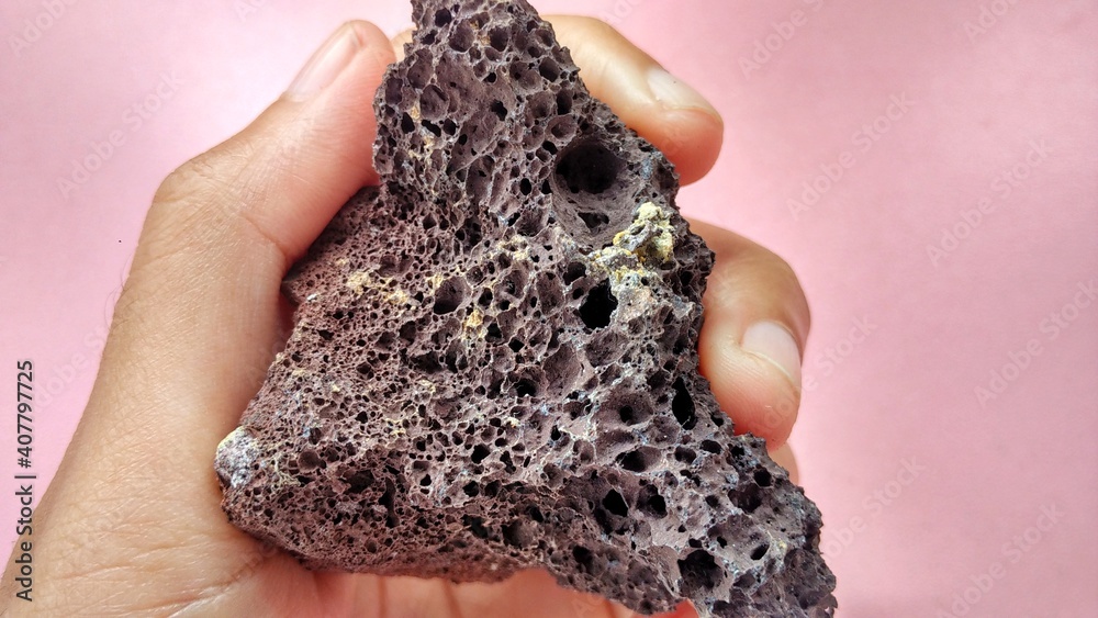 specimen Scoria igneous rock, black and brownish red color from the ...