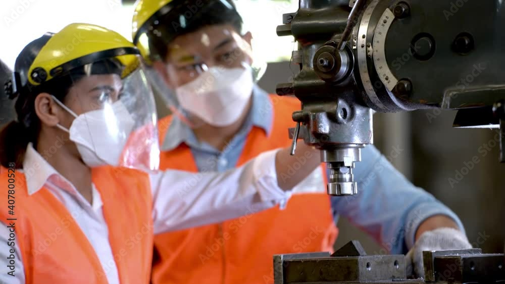 Video Stock workers factory wearing Face Shield mask and working at ...