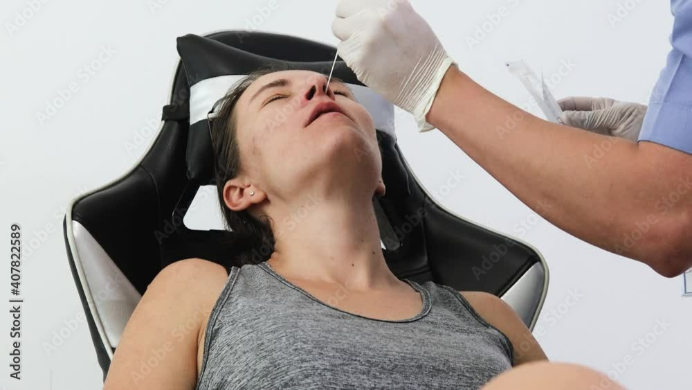 Young female tacking a CPR covid test. Home coronavirus quick Rapid ...