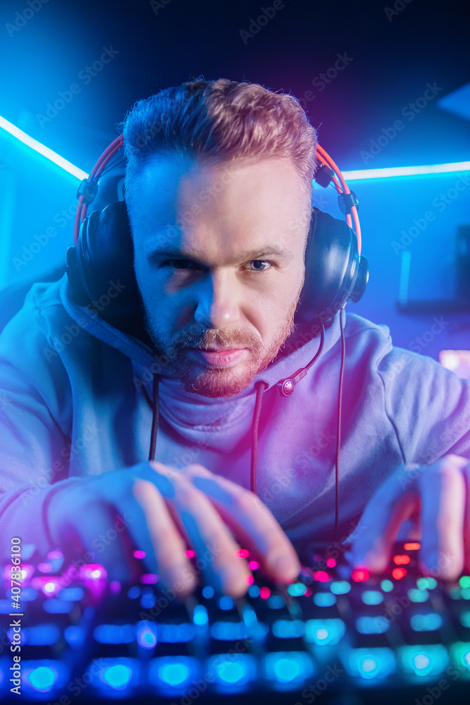 Streamer professional cyber sport gamer playing online computer game ...
