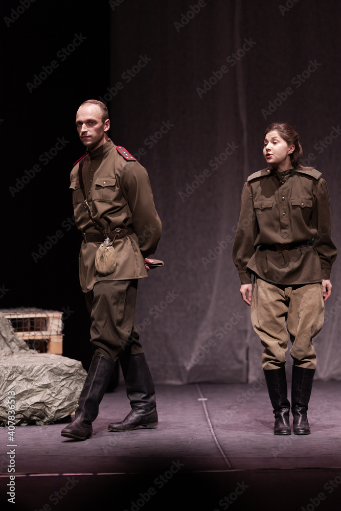 Actors in military uniforms of the Soviet army of World War II play a ...
